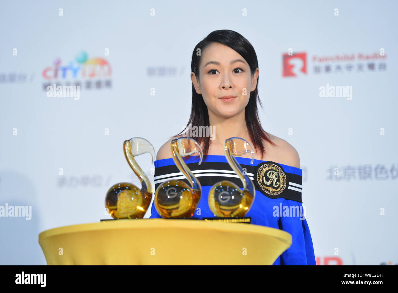 Taiwanese singer Rene Liu poses with the trophies during the award ...