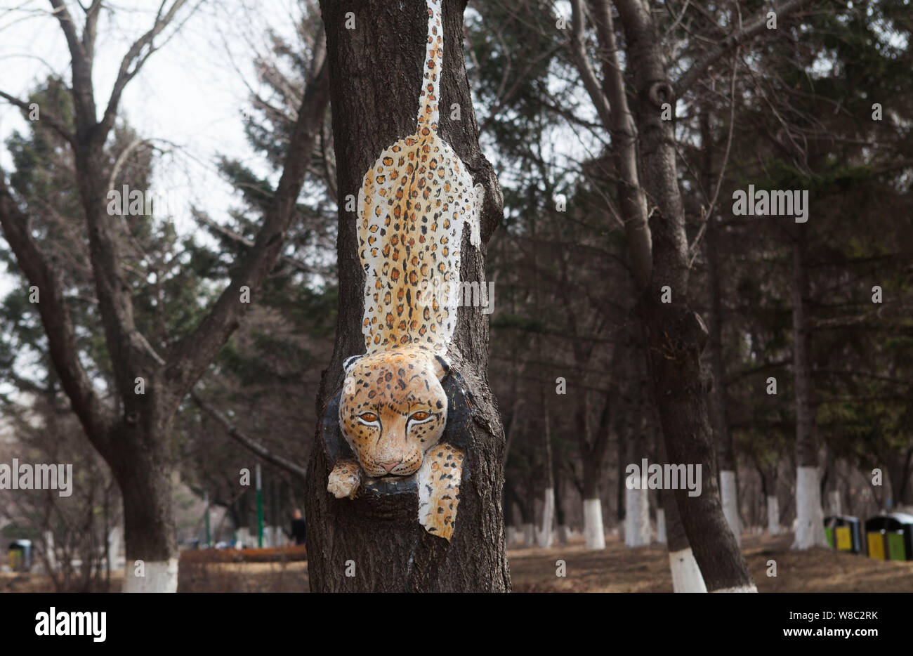 A tree hollow painting of cheetah created by Chinese art designer Feng ...