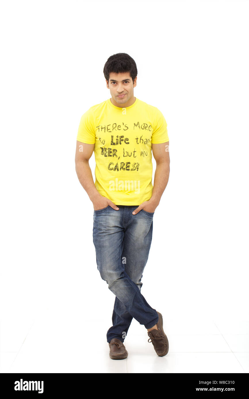 Portrait of a young man standing Stock Photo - Alamy