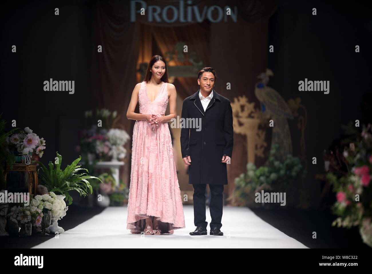 Chinese model Luo Zilin, left, and Hong Kong actor Ron Ng display new ...