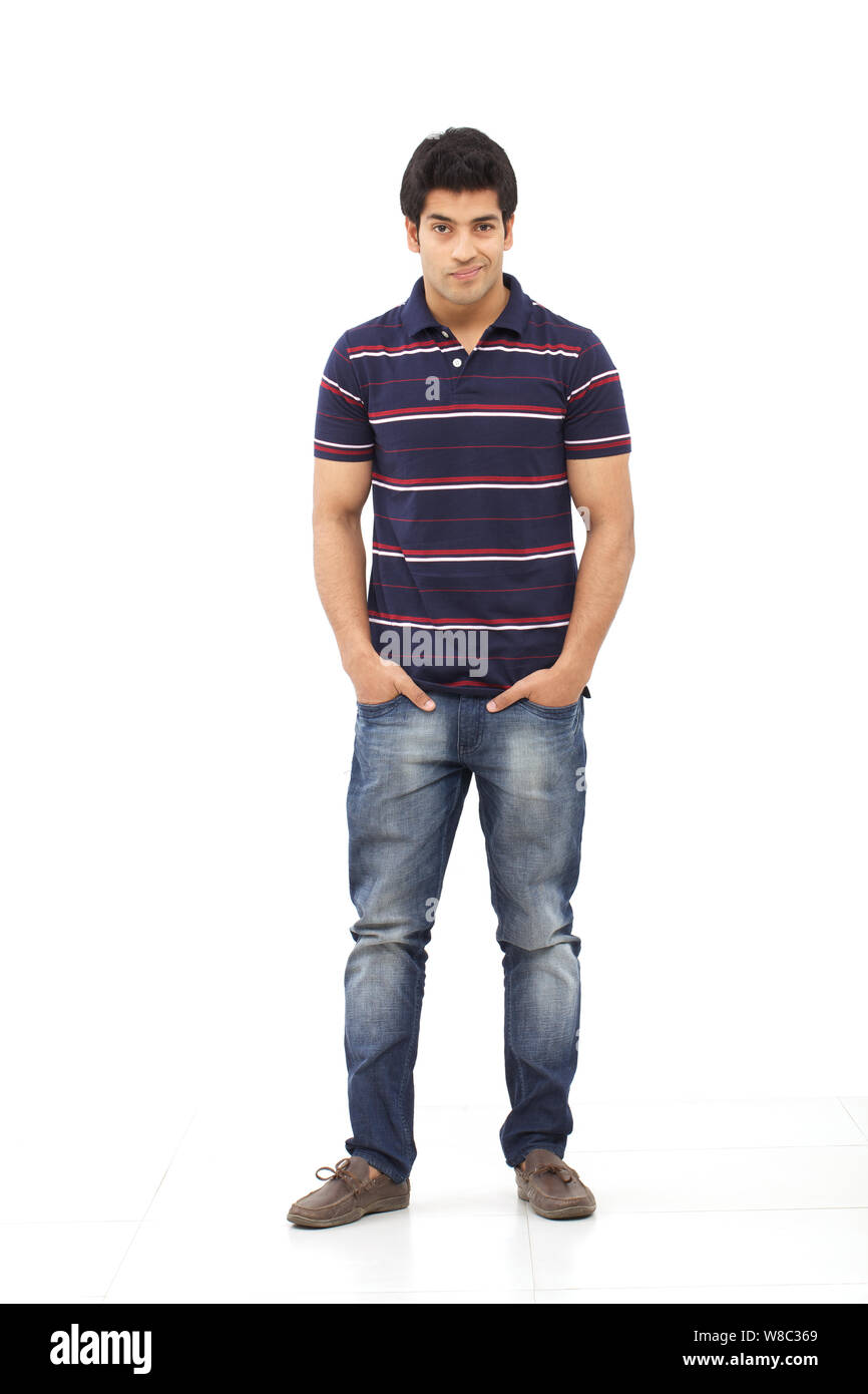 Portrait of a young man standing Stock Photo - Alamy