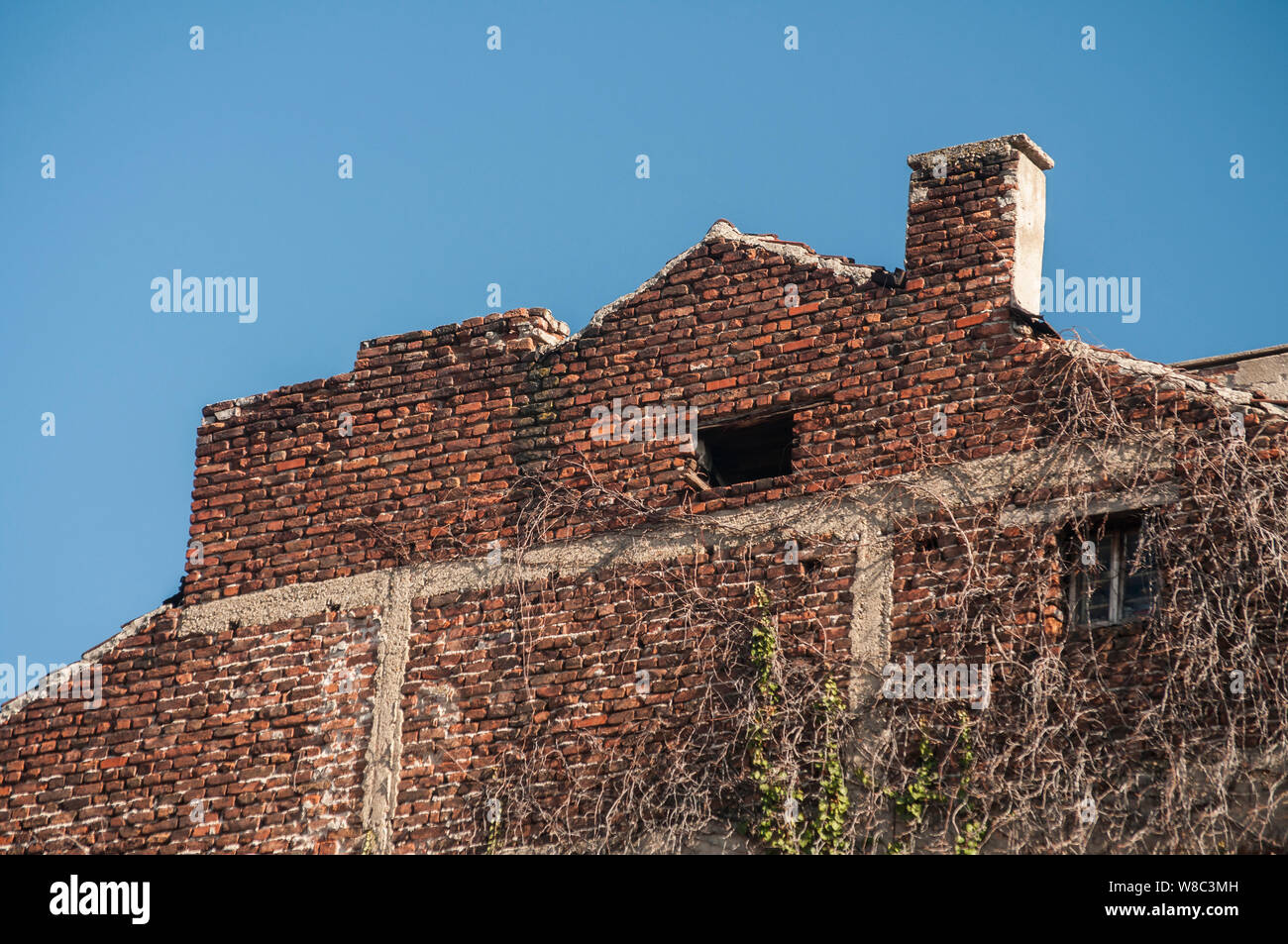 Backside old weathered vintage brick building wall facade Stock Photo ...