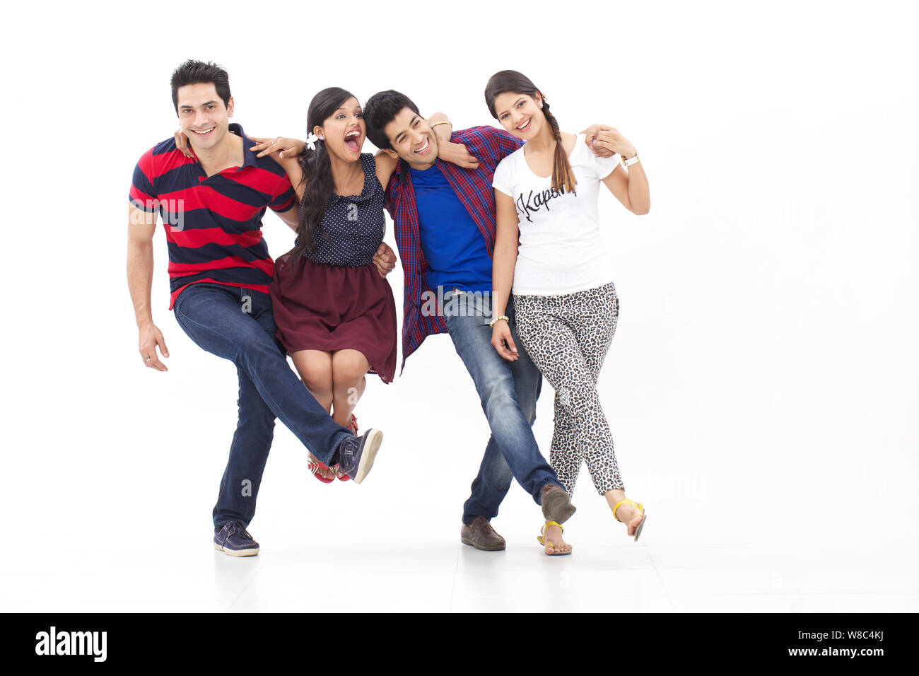 Friends dancing together Stock Photo - Alamy