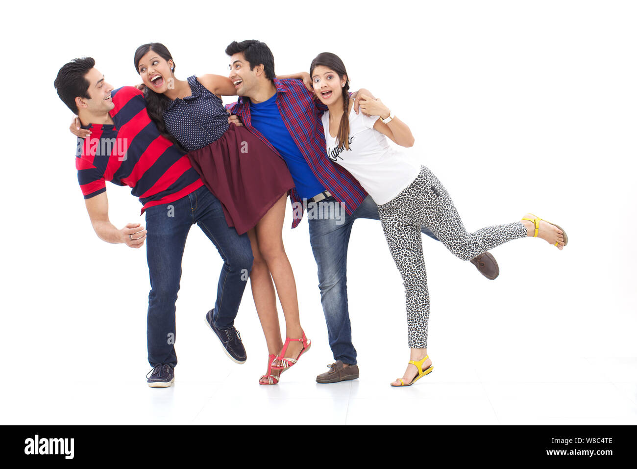 Smiling young friends playing Cut Out Stock Images & Pictures - Alamy