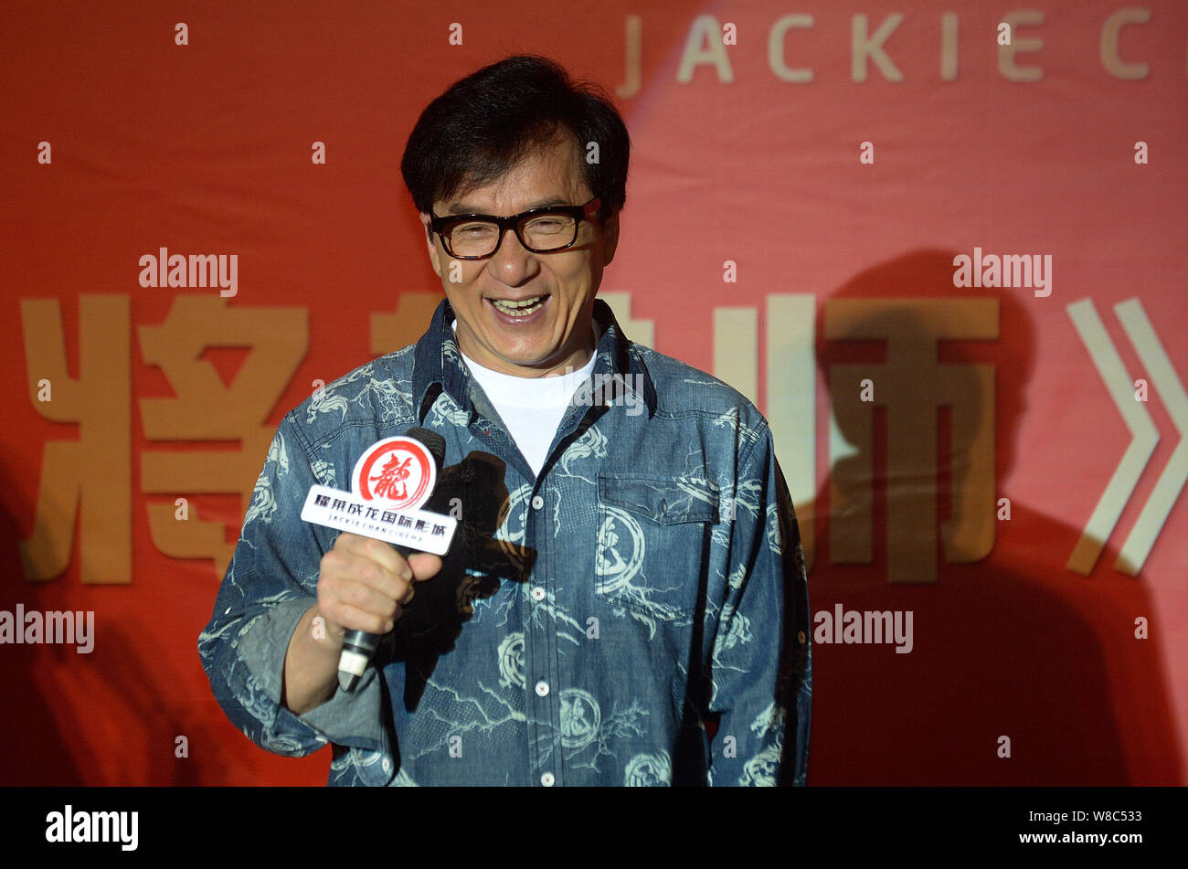 Hong Kong kungfu superstar Jackie Chan laughs at a fan meeting for his ...