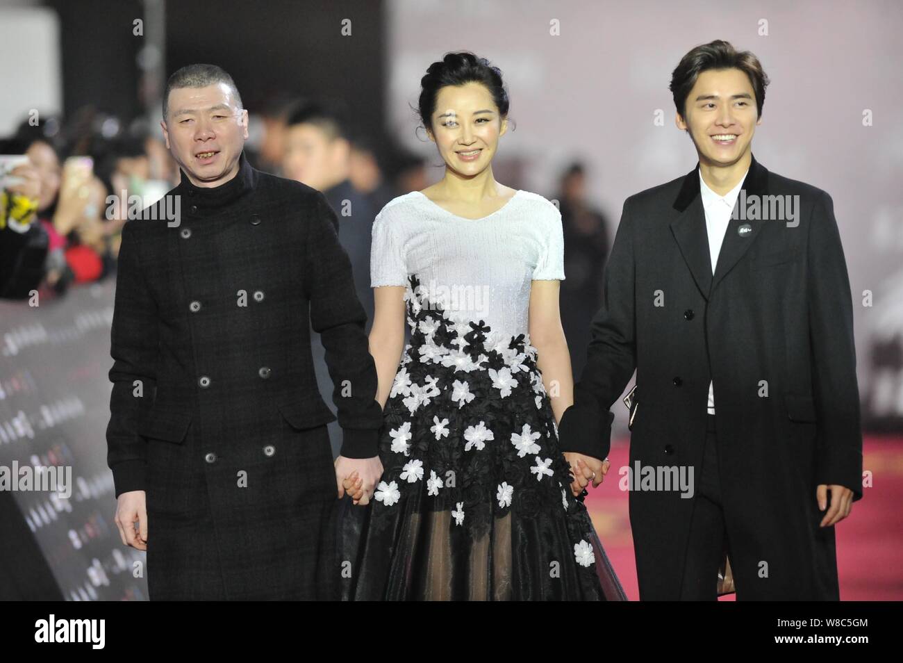 (From left) Chinese director Feng Xiaogang, actress Xu Qing and actor ...
