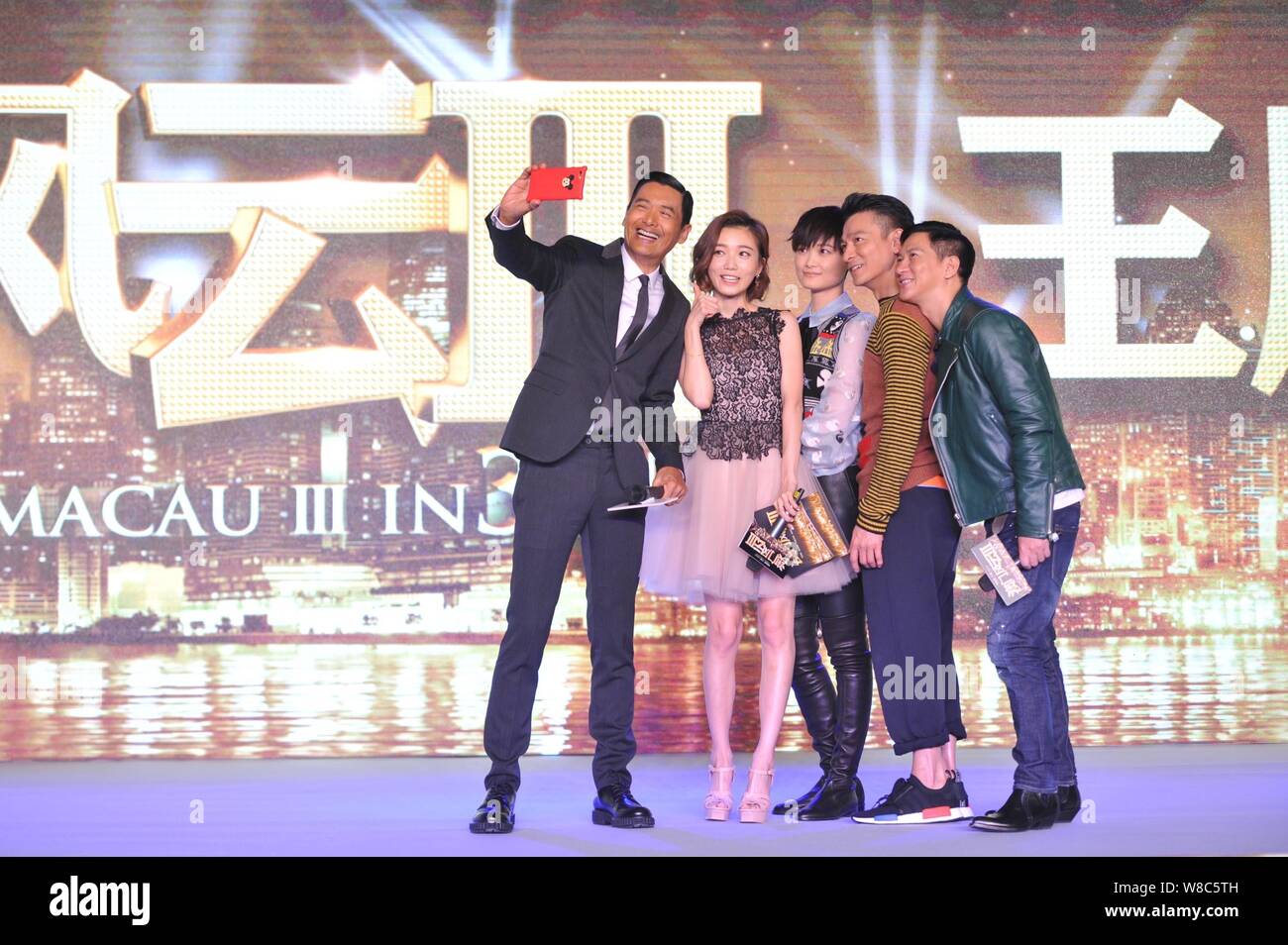 (From left) Hong Kong actor Chow Yun-fat, Chinese actress and hostess ...