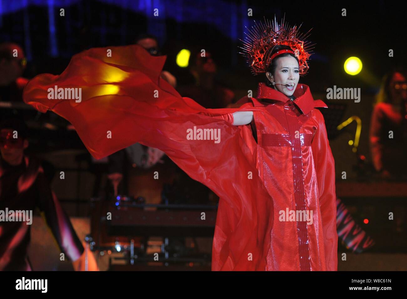 Hong Kong singer Karen Mok performs during her concert in Beijing ...