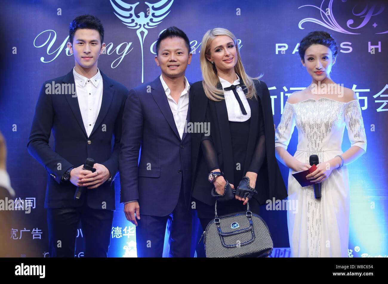 American socialite Paris Hilton, second right, attends a press ...