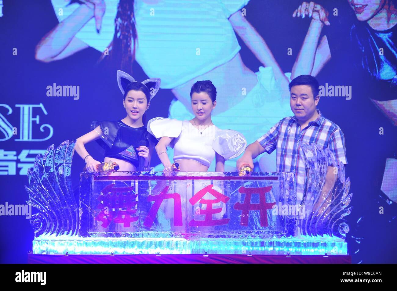 The twin sisters Miko and Yumi of Singaporean girl group BY2 pose at a ...