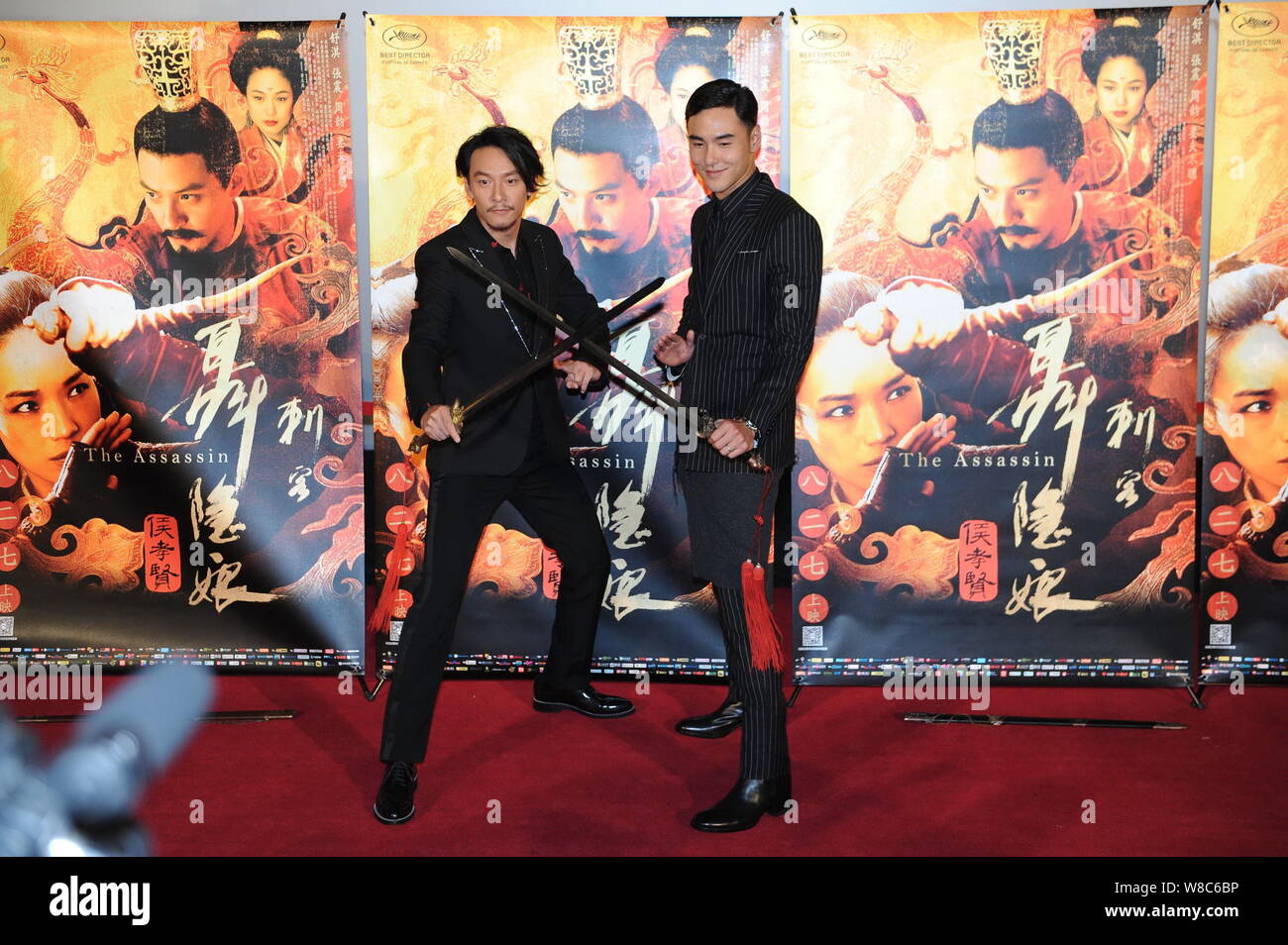 Taiwanese actors Chang Chen, left, and Ethan Juan pose during a press ...