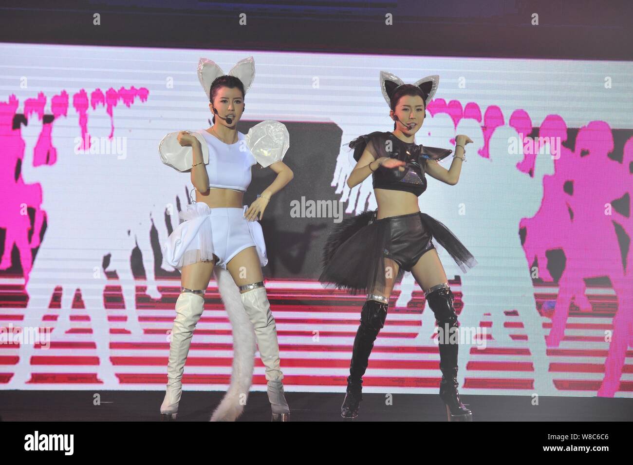 The twin sisters Miko and Yumi of Singaporean girl group BY2 perform at ...