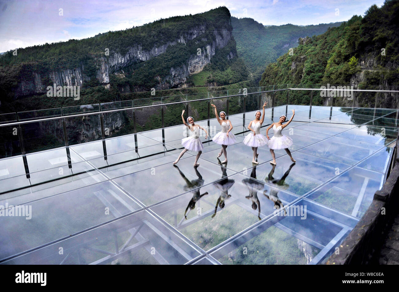 Ballet dancers dance on the Asia's largest glass viewing platform on ...