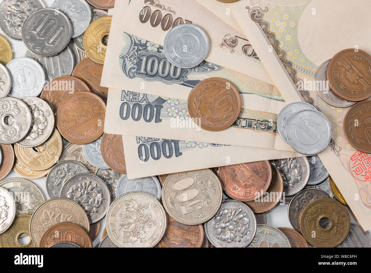 Japanese yen banknotes coins hi-res stock photography and images - Alamy