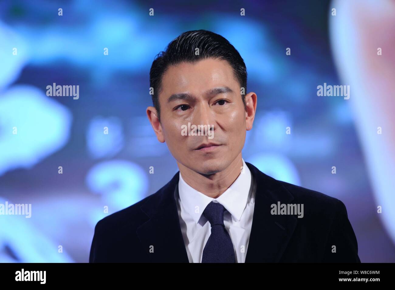 Hong Kong singer and actor Andy Lau poses during a press conference for ...