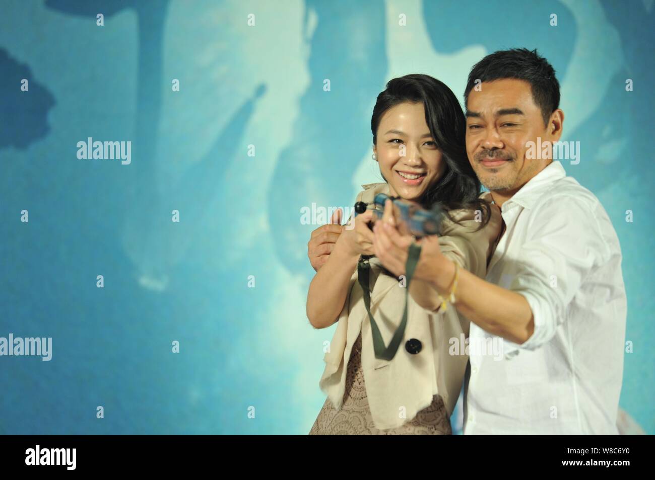 Chinese actress Tang Wei, left, and Hong Kong actor Sean Lau pose ...