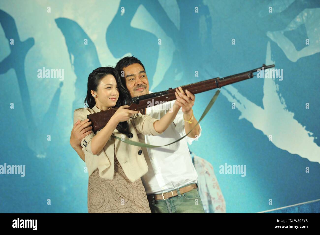 Chinese actress Tang Wei, left, and Hong Kong actor Sean Lau pose ...