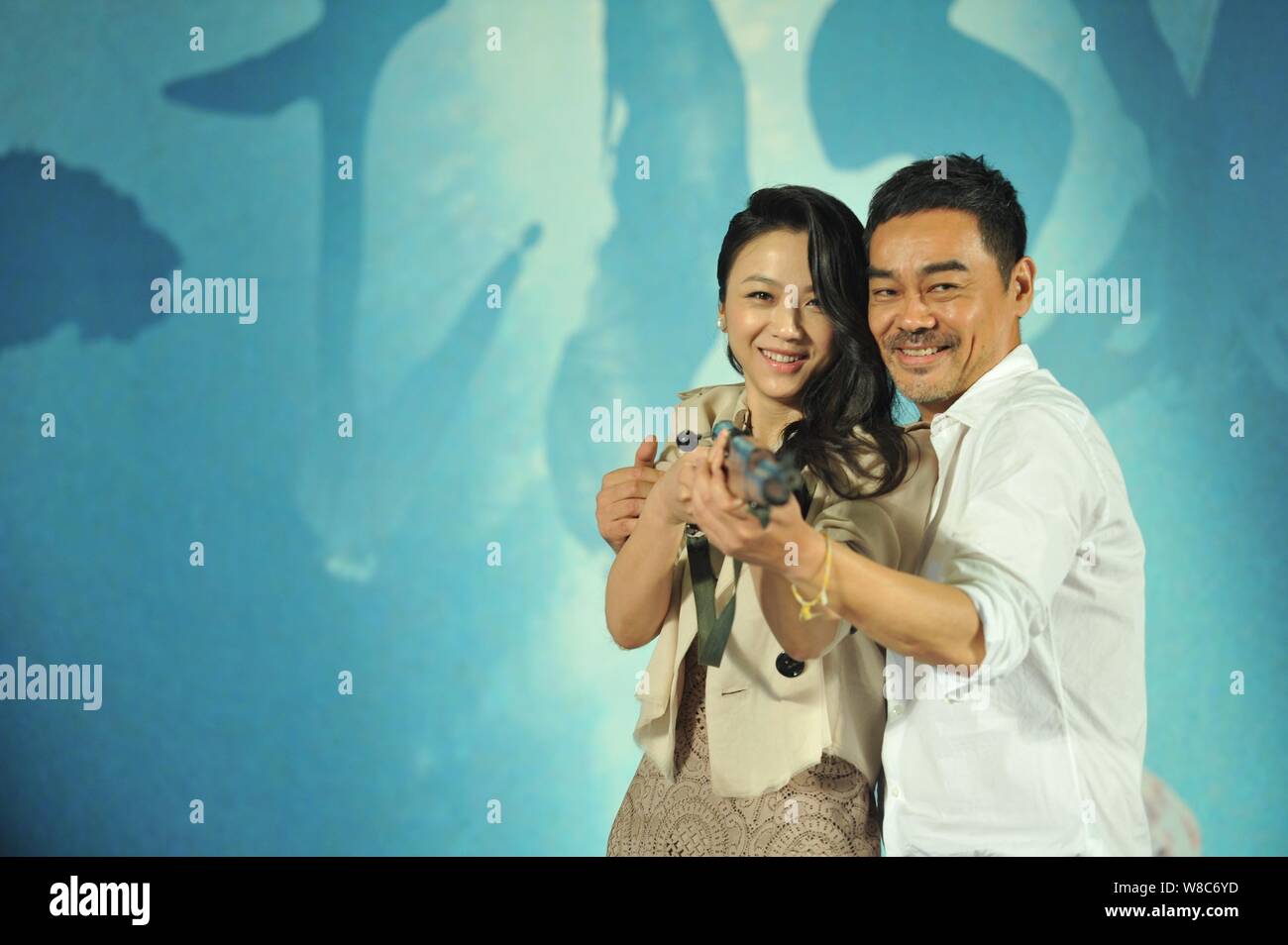 Chinese actress Tang Wei, left, and Hong Kong actor Sean Lau pose ...