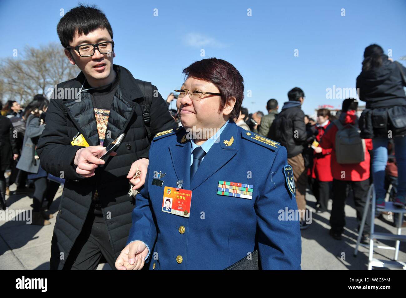 --FILE--Chinese Tibetan singer Han Hong, right, dressed in a military ...