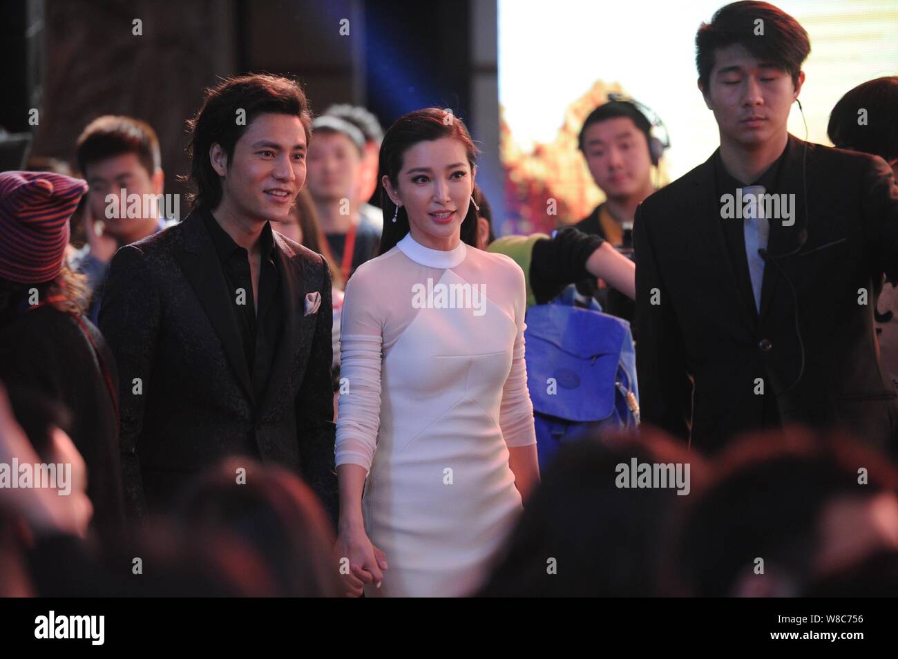 Chinese actress Li Bingbing, center, and actor Chen Kun, left, arrive ...