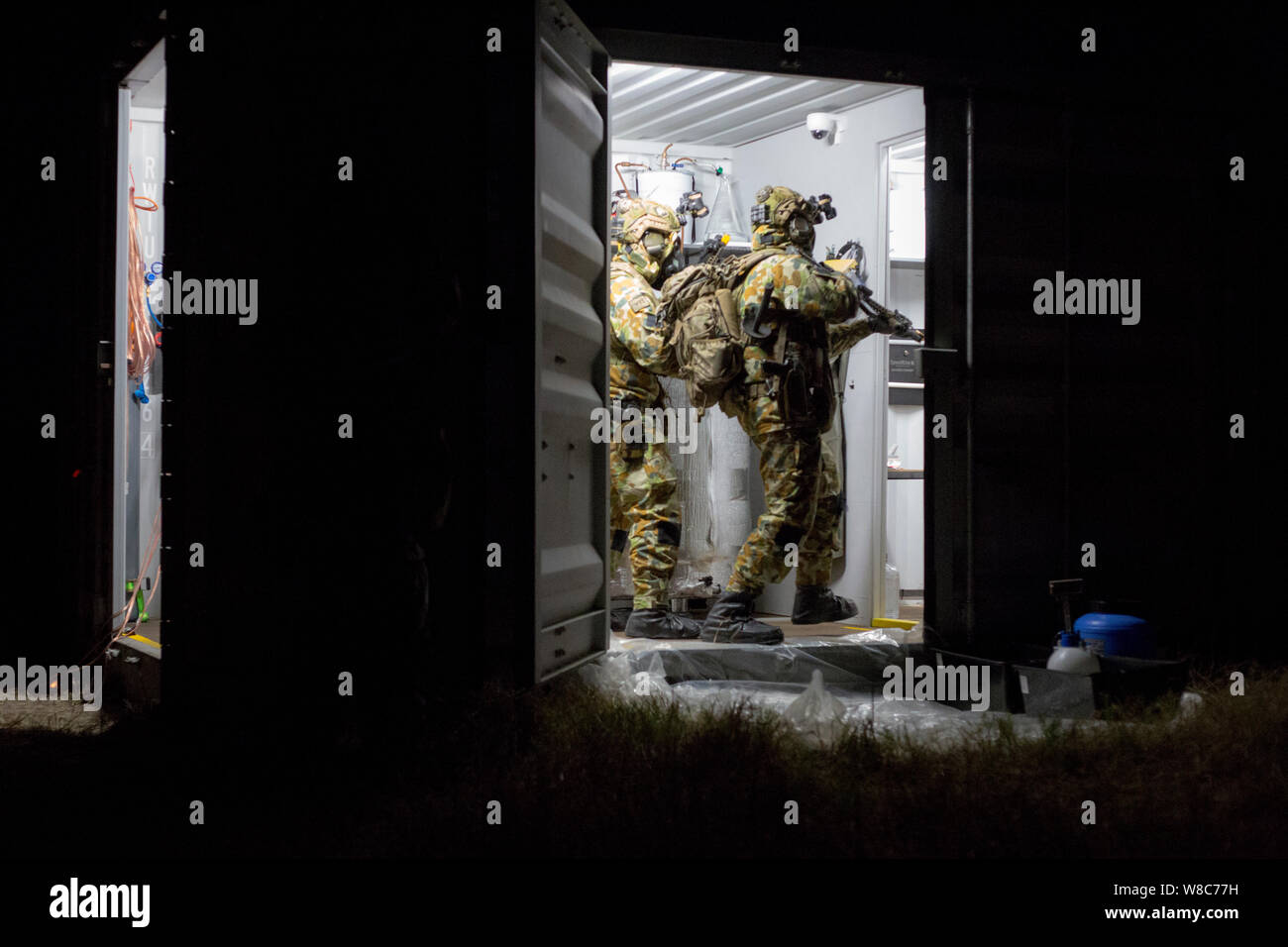 A team from the Australian Army’s 2nd Commando Regiment clears a ...