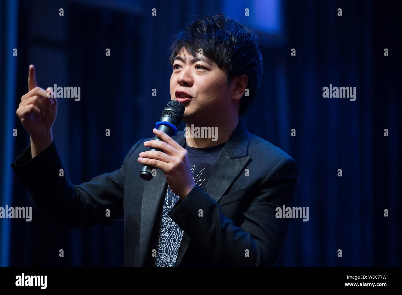 Chinese pianist Lang Lang attends a piano class for university students ...