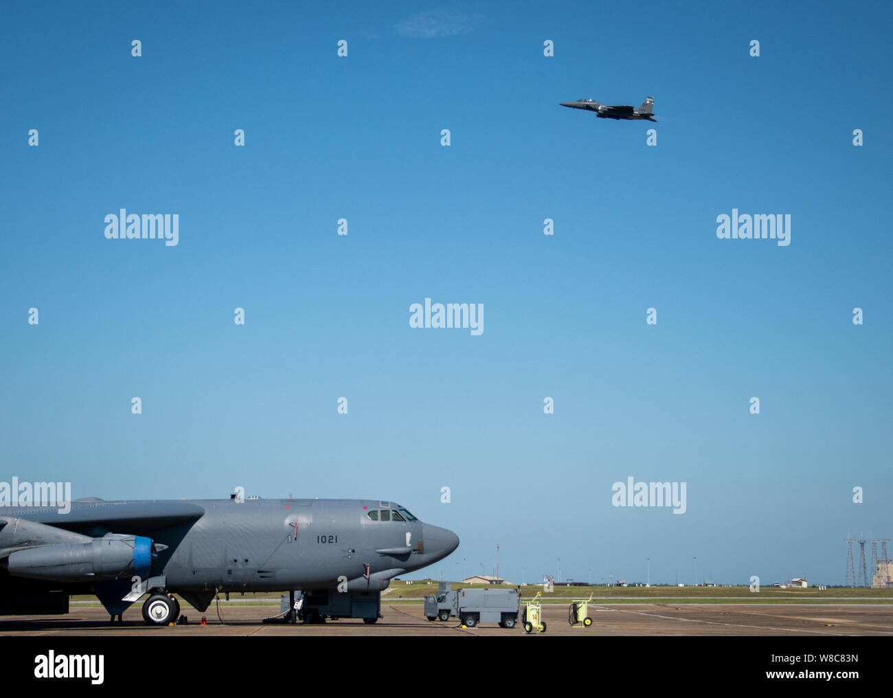 An 53rd Wing F-15 Eagle flies over another of the wing’s aircraft, the ...