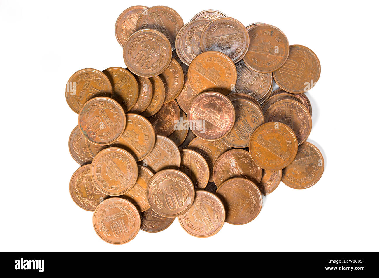 Pile of 10 yen coins japanese money, close up on white background Stock ...