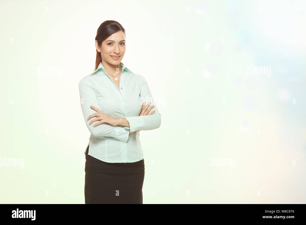 Young beautiful woman arms crossed hi-res stock photography and images ...