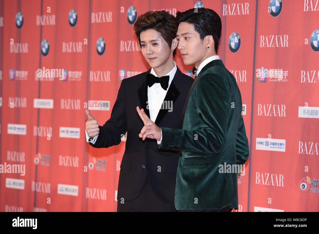 Chinese singers and actors Lu Han, left, and Jing Boran arrive on the ...