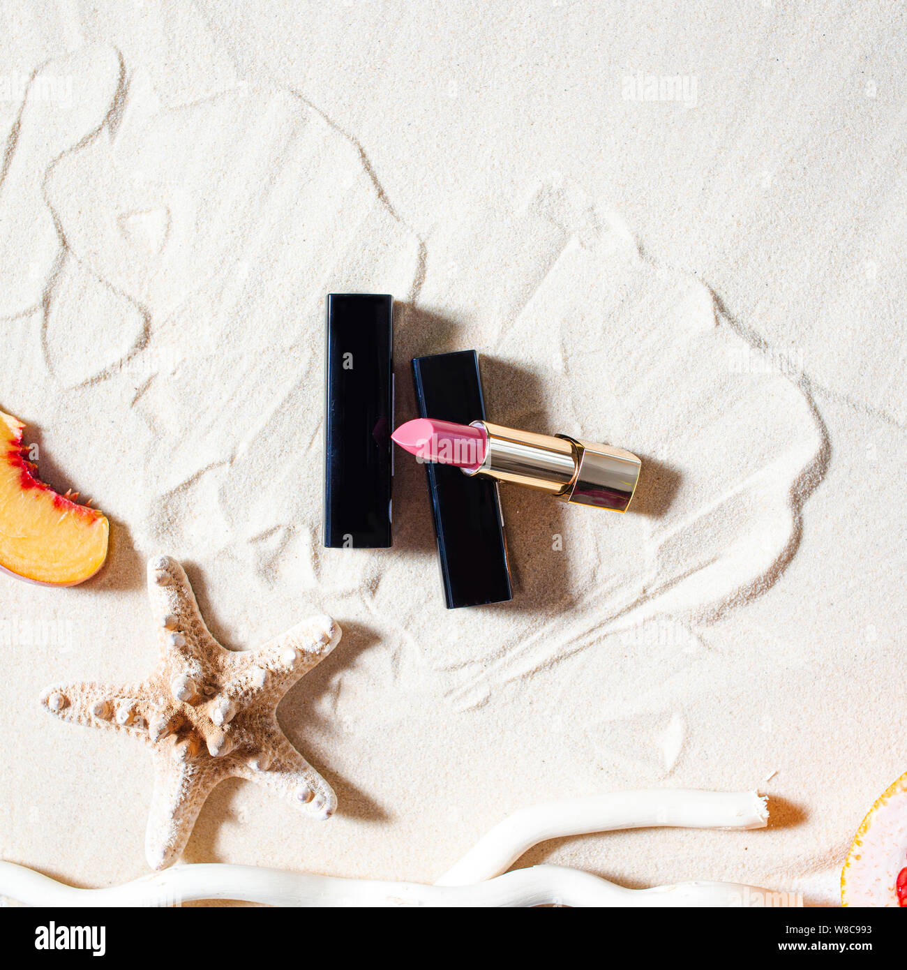 Wonderful beach. Decorative cosmetics, lipstick, lip gloss, lip balm ...