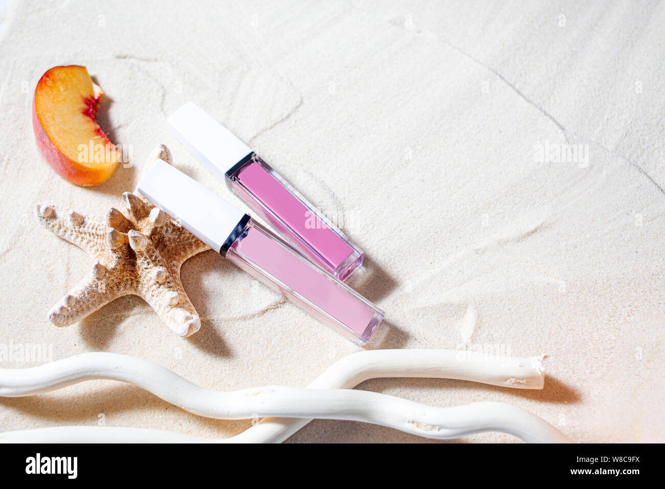 Wonderful beach. Decorative cosmetics, lipstick, lip gloss, lip balm ...