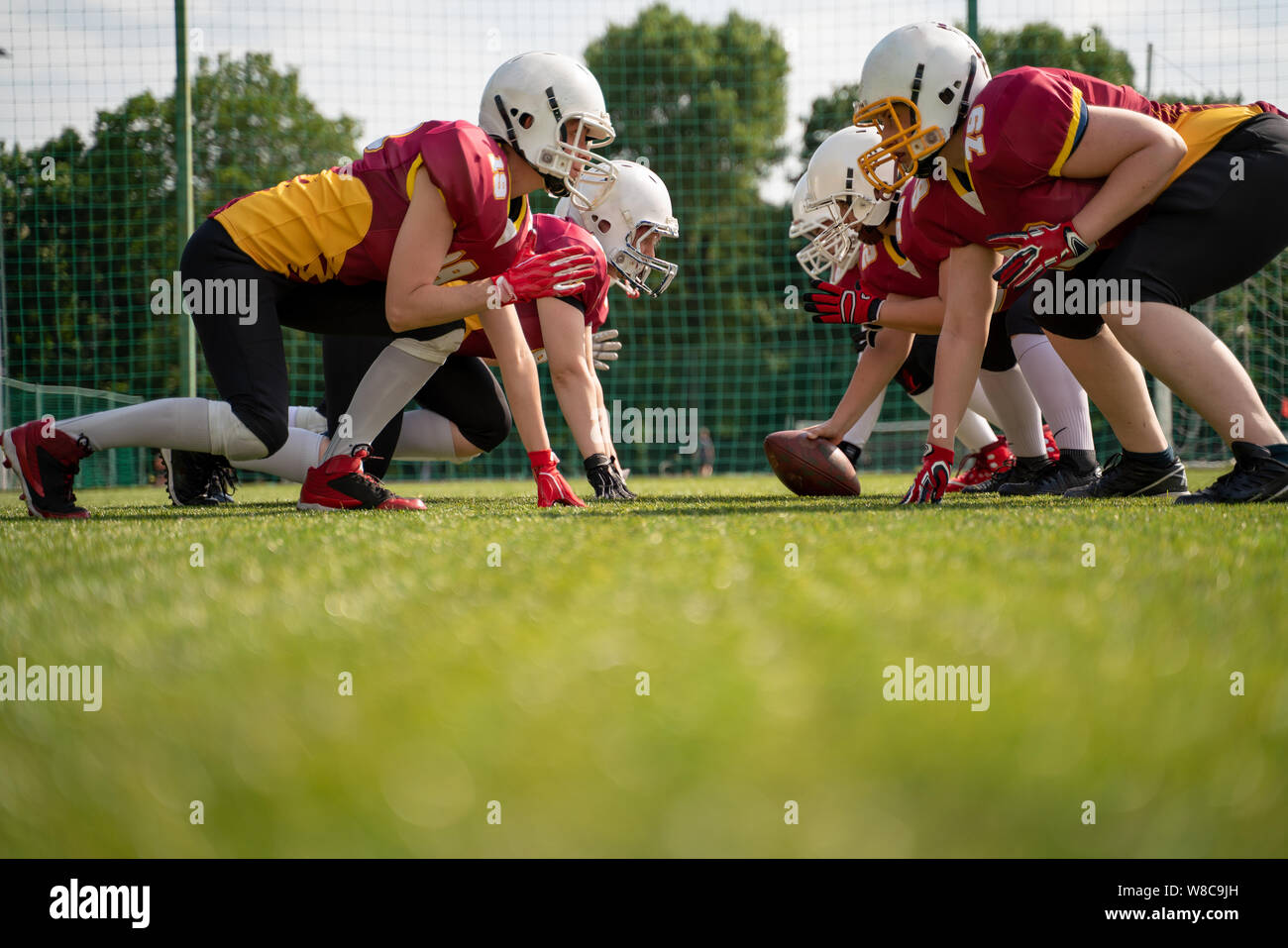 Image of female team playing rugby on playground Stock Photo - Alamy