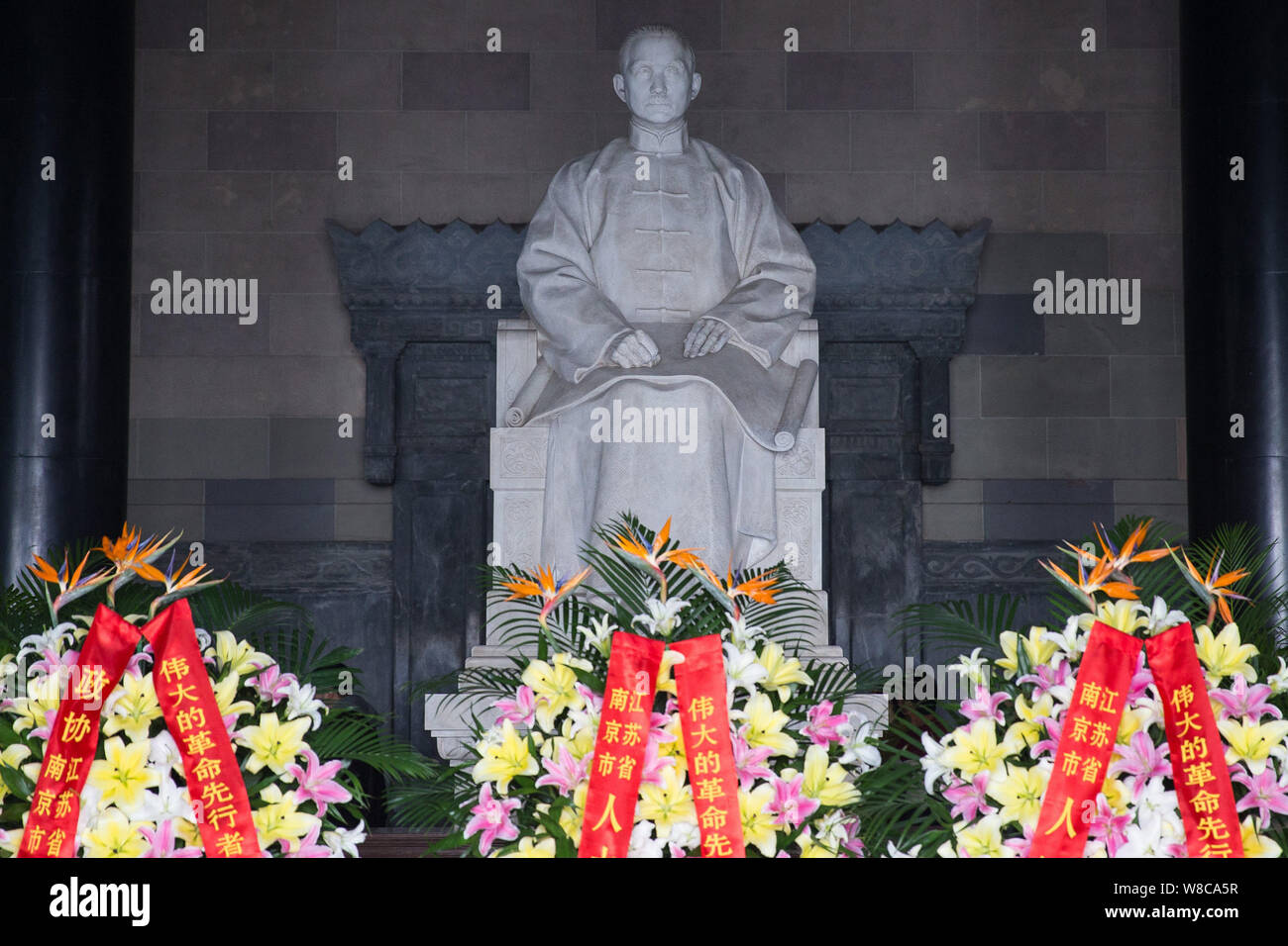 Wreaths are put in front of a statue of Sun Yat-sen at the sacrificial ...