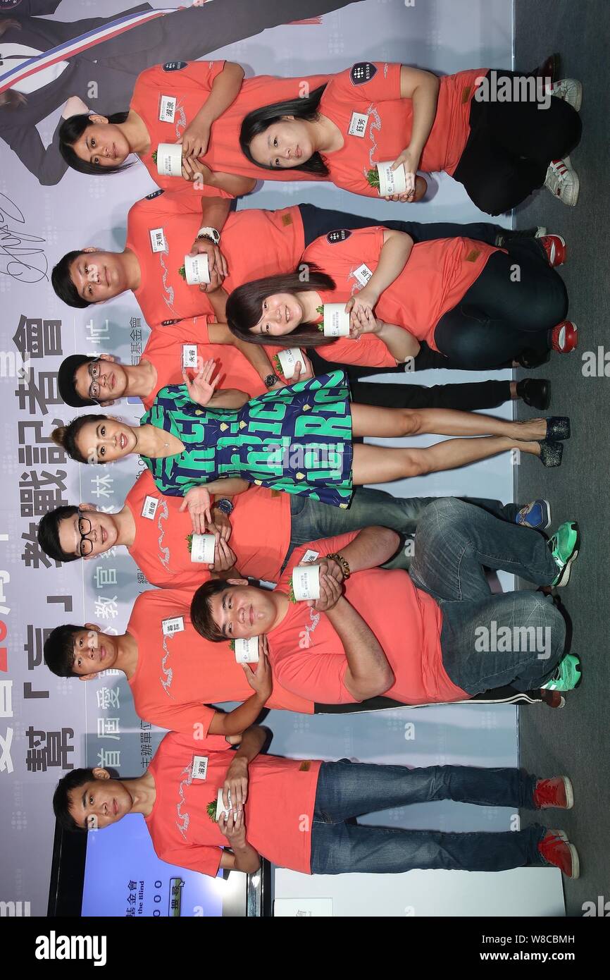 Taiwanese singer Jolin Tsai, center, poses during a charity event for ...