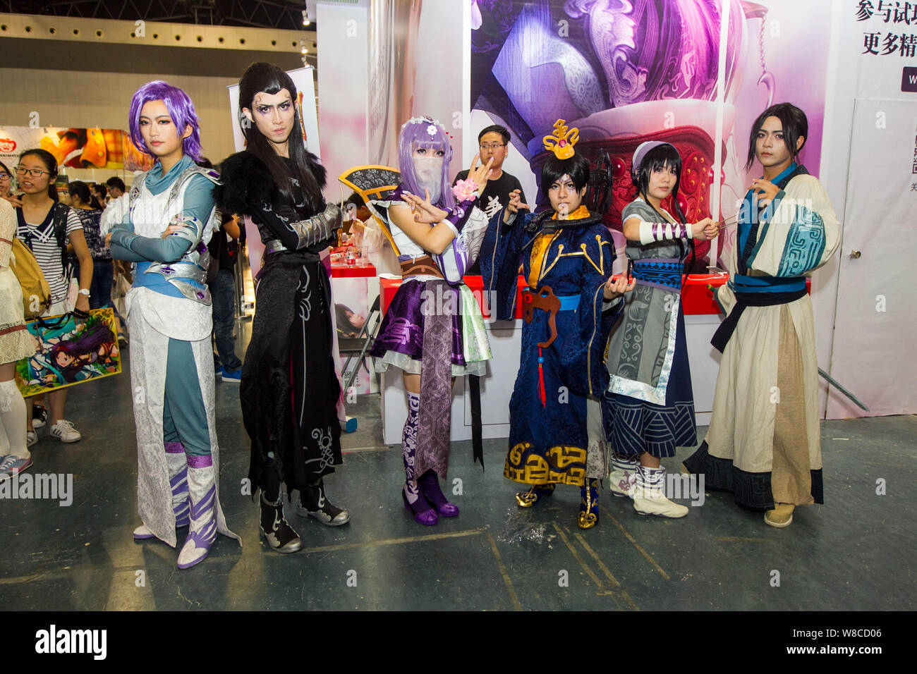 Entertainers dressed in cosplay costumes pose during the 11th China ...