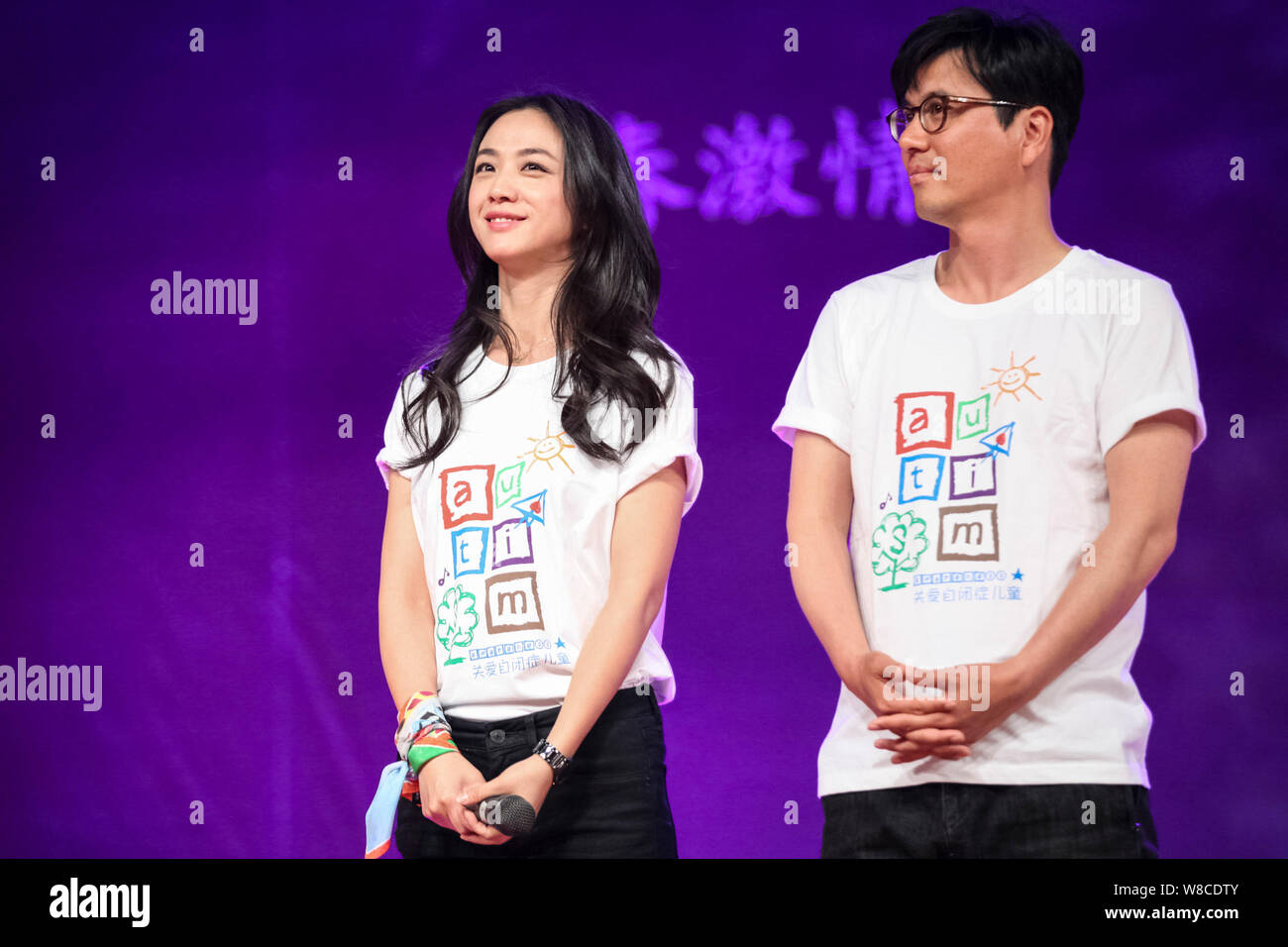 Chinese actress Tang Wei, left, and her South Korean director husband ...