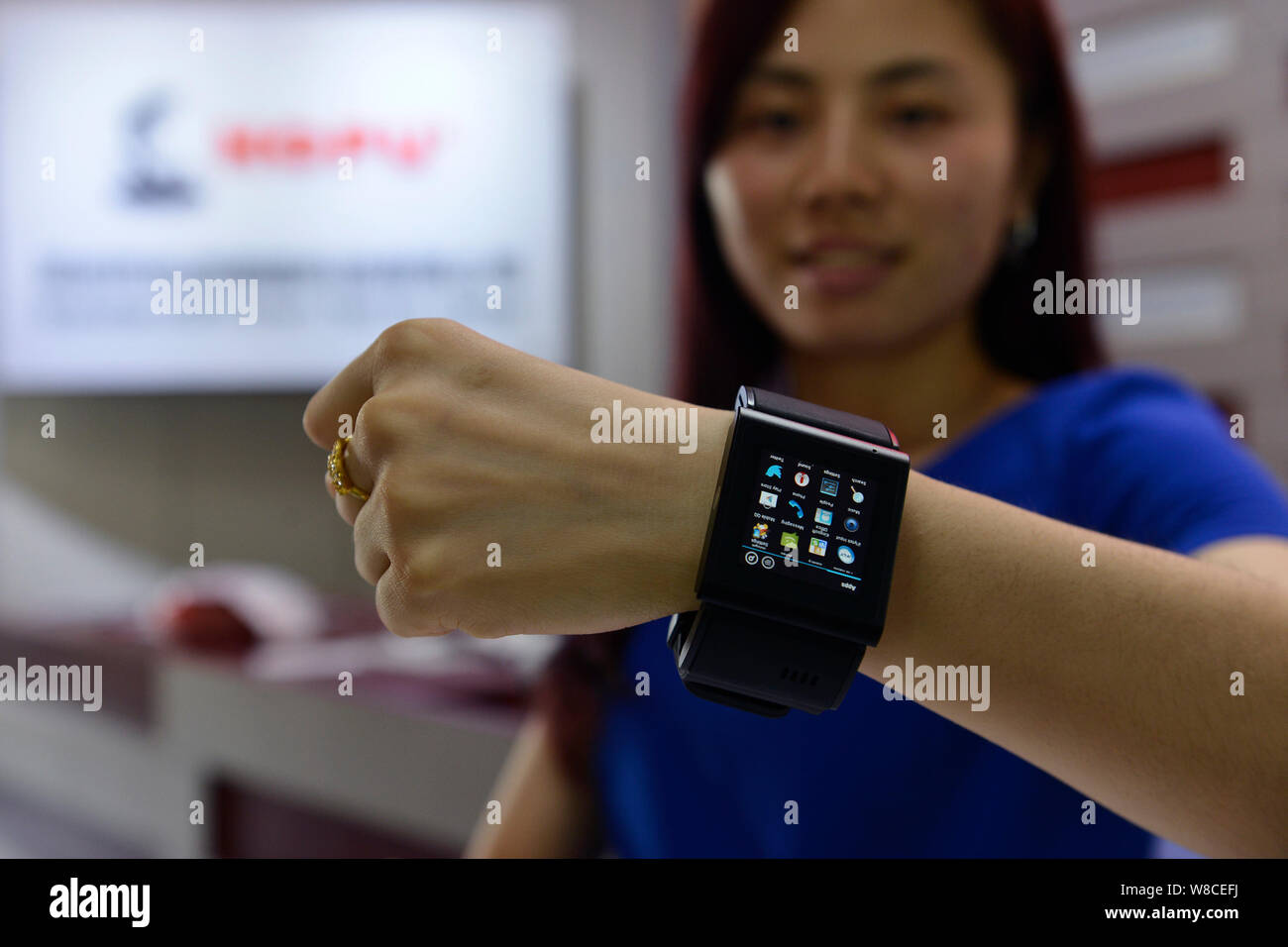 Chinese employee shows smart hi-res stock photography and images - Alamy
