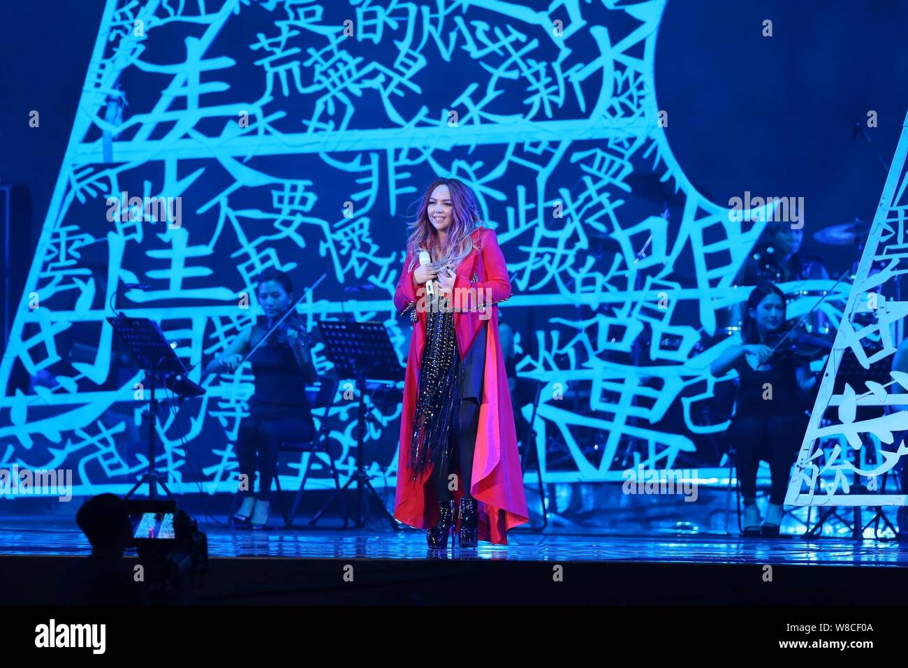 Taiwanese singer A Mei performs during her concert in Taipei, Taiwan, 5 ...