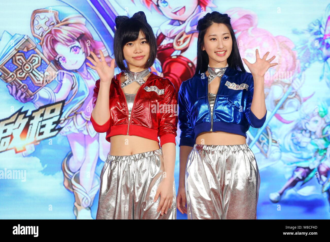 China Kamino, right, and Chieko Ito of Japanese gril group Stever pose ...
