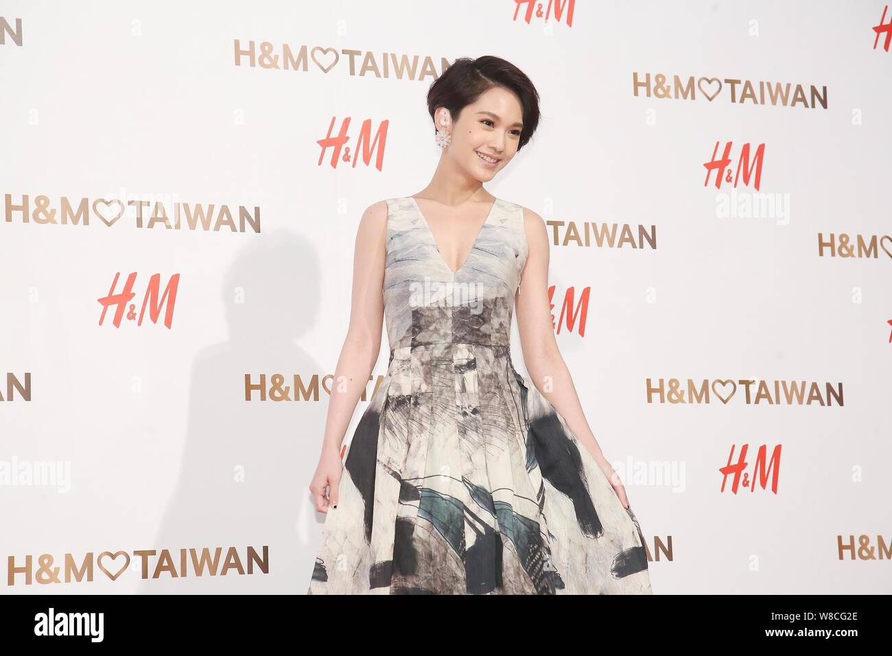 Taiwanese singer Rainie Yang poses during the opening ceremony of an H&M flagship store in ...