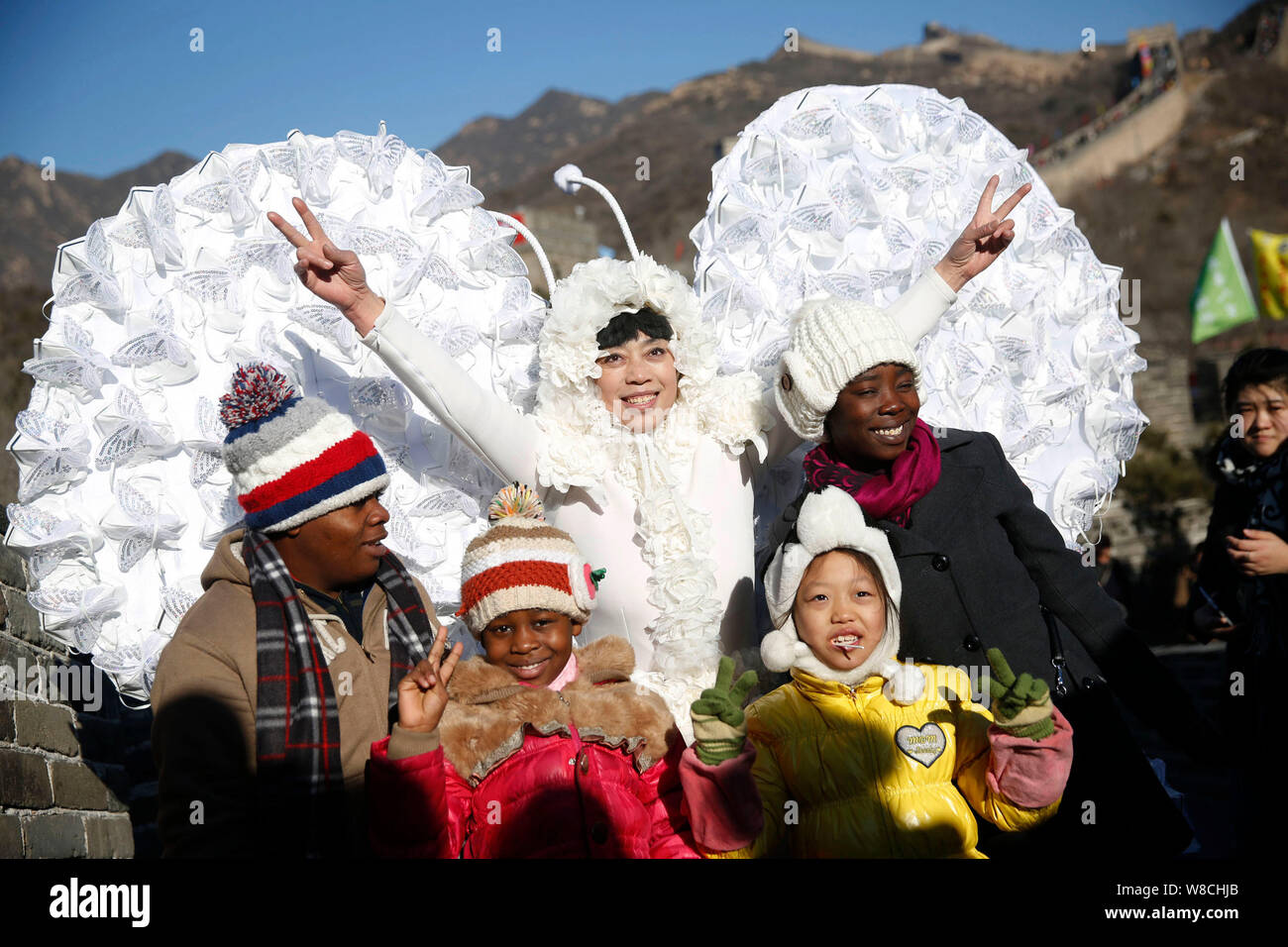 Chinese artist Kong Ning, right, dressed in a butterfly costume made ...