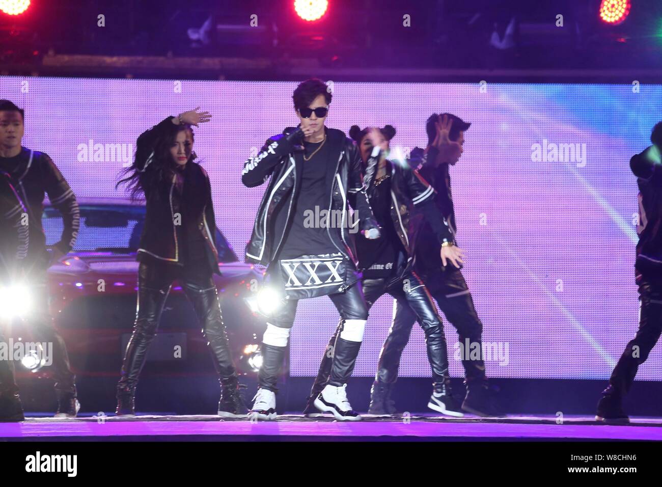 Taiwanese singer Show Lo, center, performs during the 2015 Taipei New ...