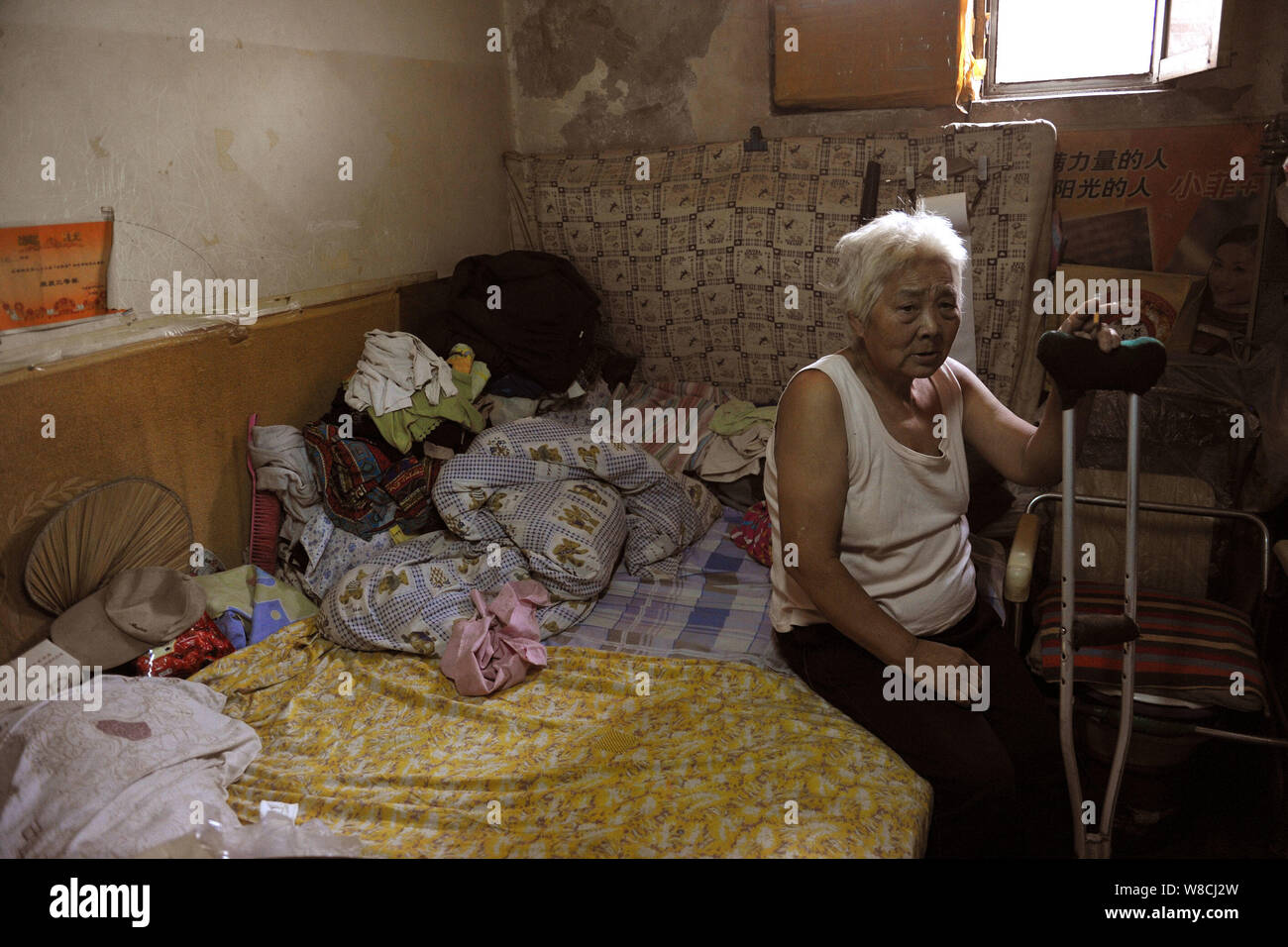 China poverty bed hi-res stock photography and images - Alamy