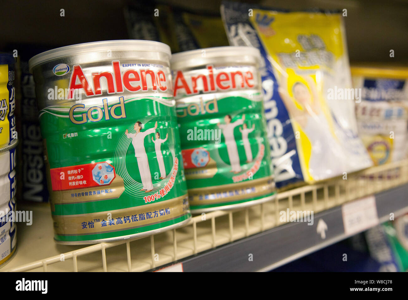 --FILE--Tins of Anlene milk powder of Fonterra are for sale at a ...