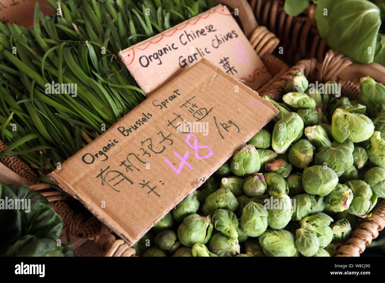 Organic vegetables are for sale at a farmer's market of Bio Farm in ...