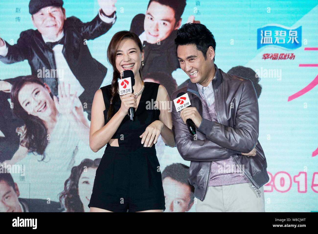 Hong Kong actress Cherrie Ying, left, and Chinese actor Yuan Hong laugh ...
