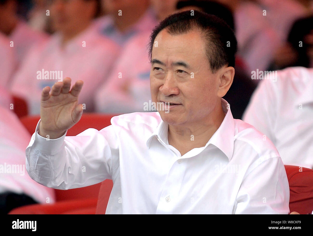 Wang Jianlin, Chairman of Dalian Wanda Group, speaks at a ceremony for ...