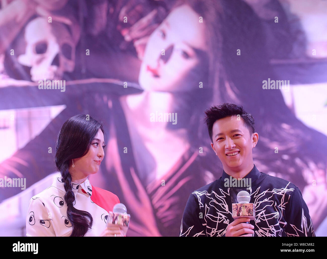 Chinese actress Fan Bingbing, left, looks at actor Han Geng during a ...
