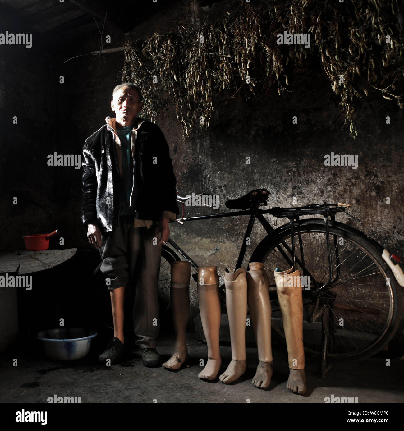 --FILE--70-year-old Chinese villager Wang Miyi of Miao ethnic minority ...